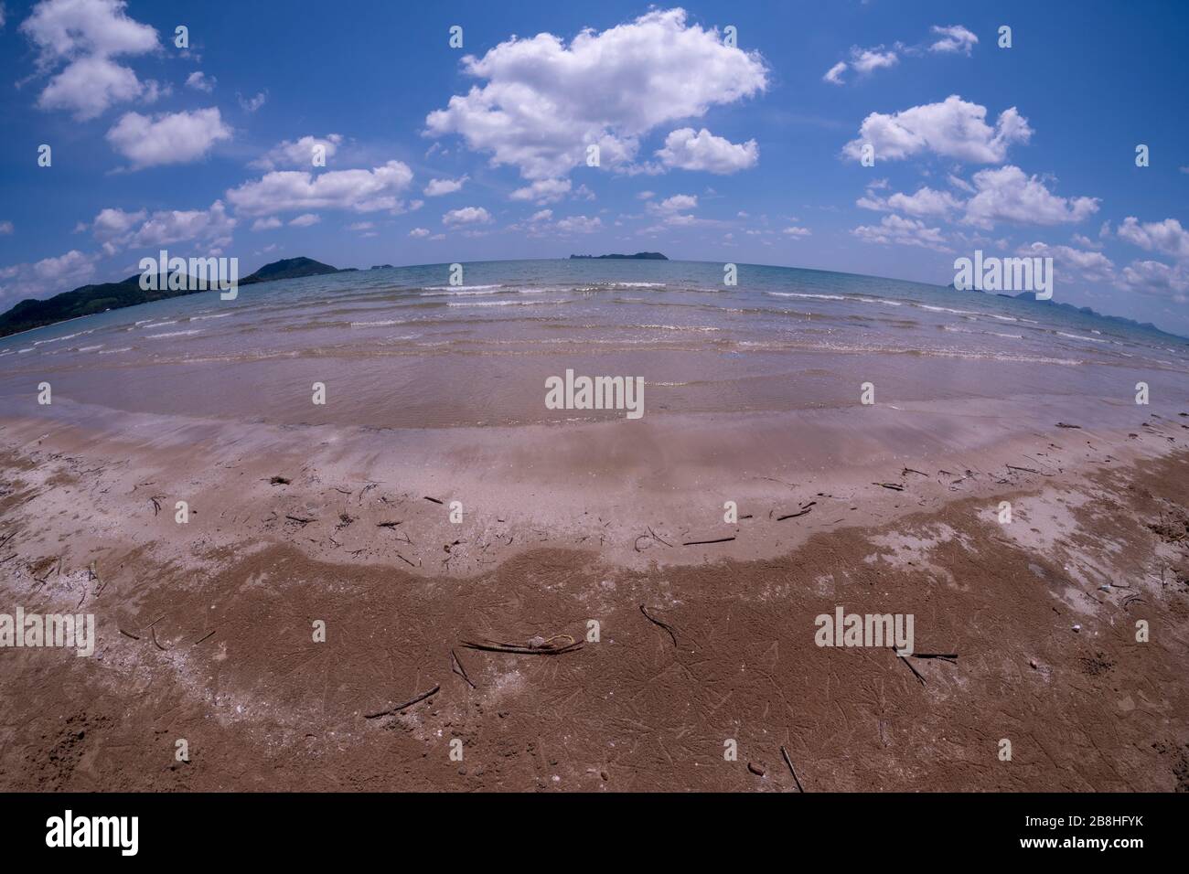 Daytime beach wide angle. Sairee Beach, March 2019. Fluffy white clouds ...