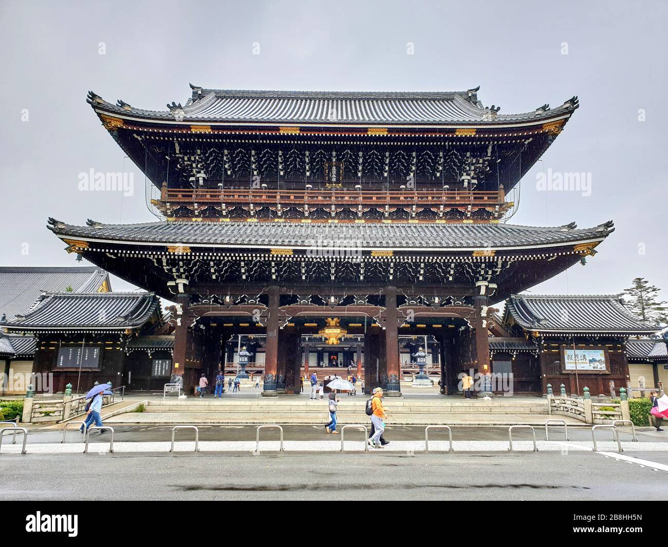 Two stories high gate to enter temple grounds Stock Photo - Alamy