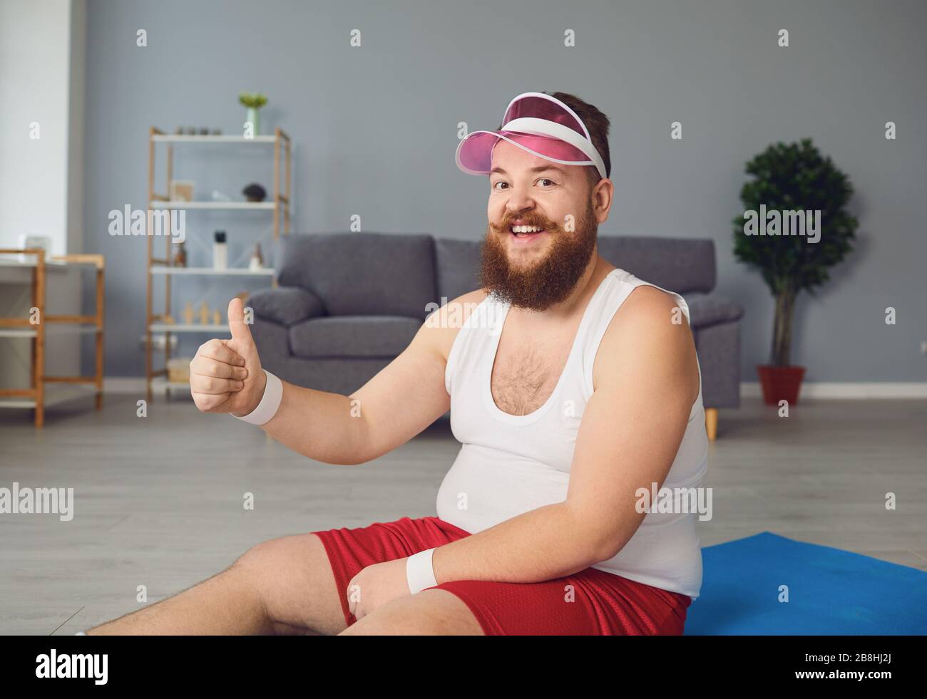 Fat man sitting home on hi-res stock photography and images - Alamy