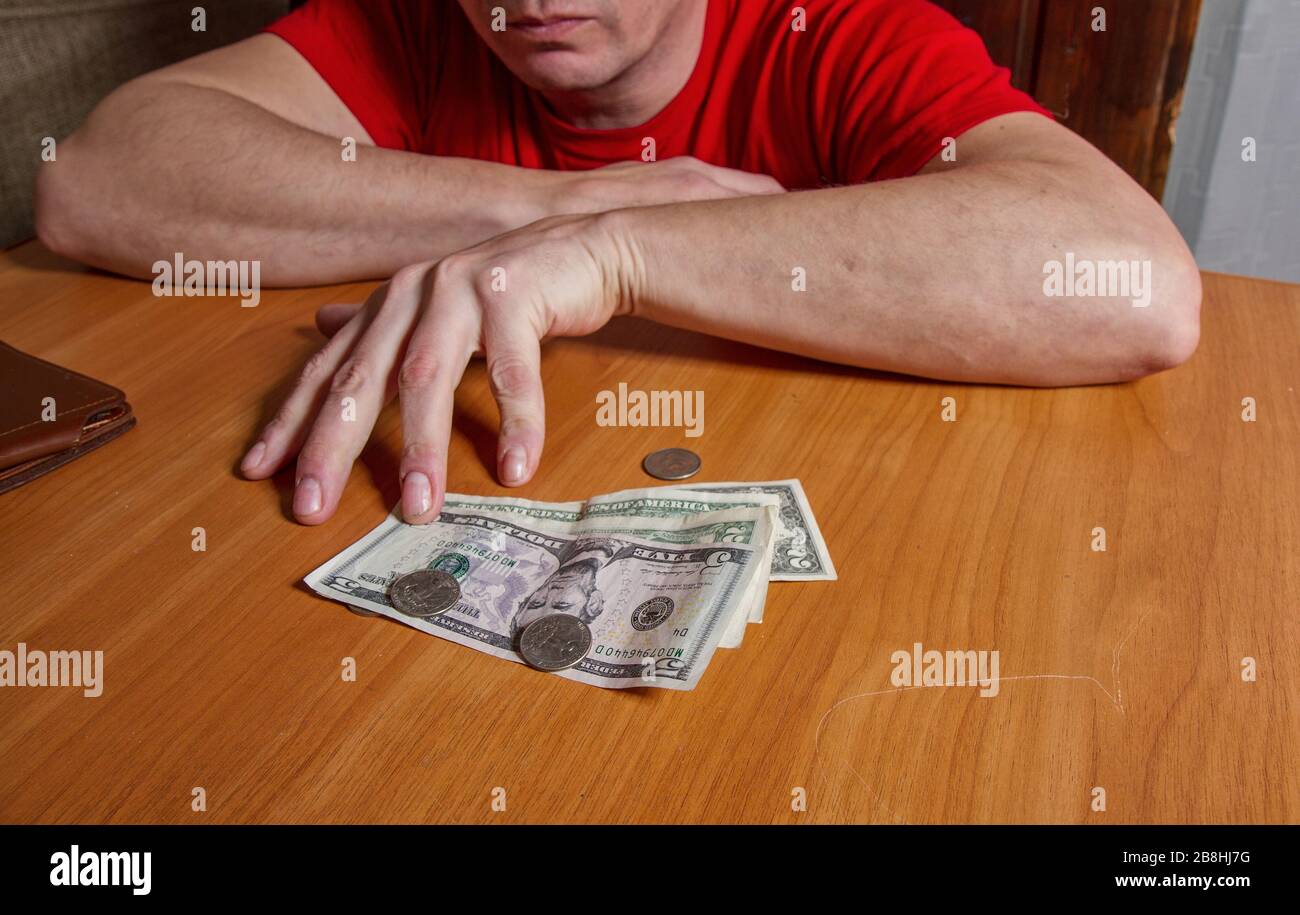 poor men money Stock Photo - Alamy