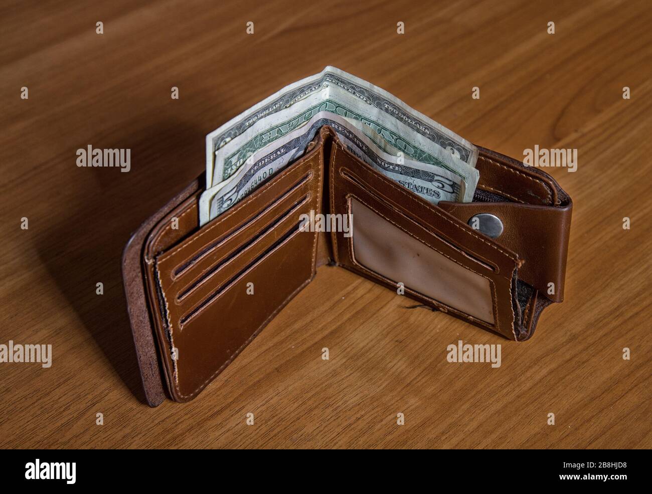 wallet little money Stock Photo - Alamy