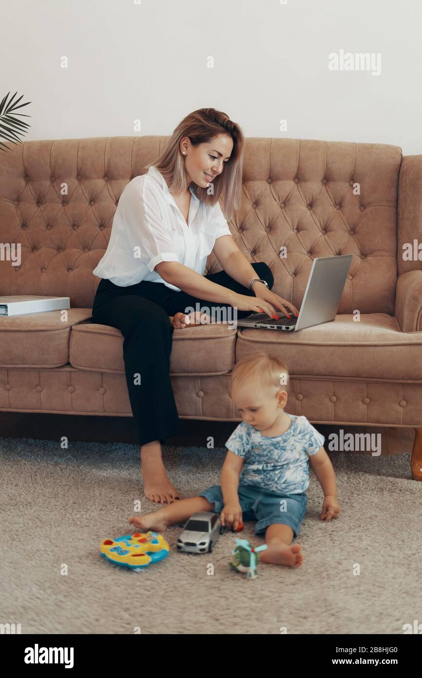 Multitasking woman kid hi-res stock photography and images - Alamy