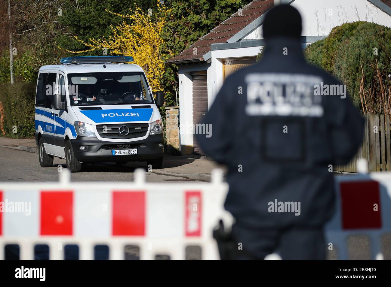 Stuttgart, Germany. 22nd Mar, 2020. A police officer is standing in ...