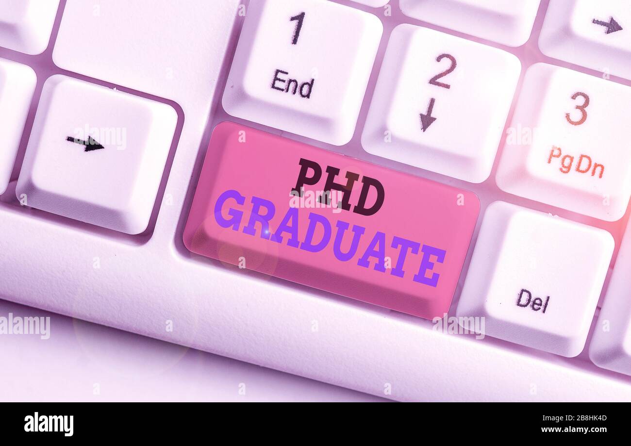 Handwriting text Phd Graduate. Conceptual photo highest university ...