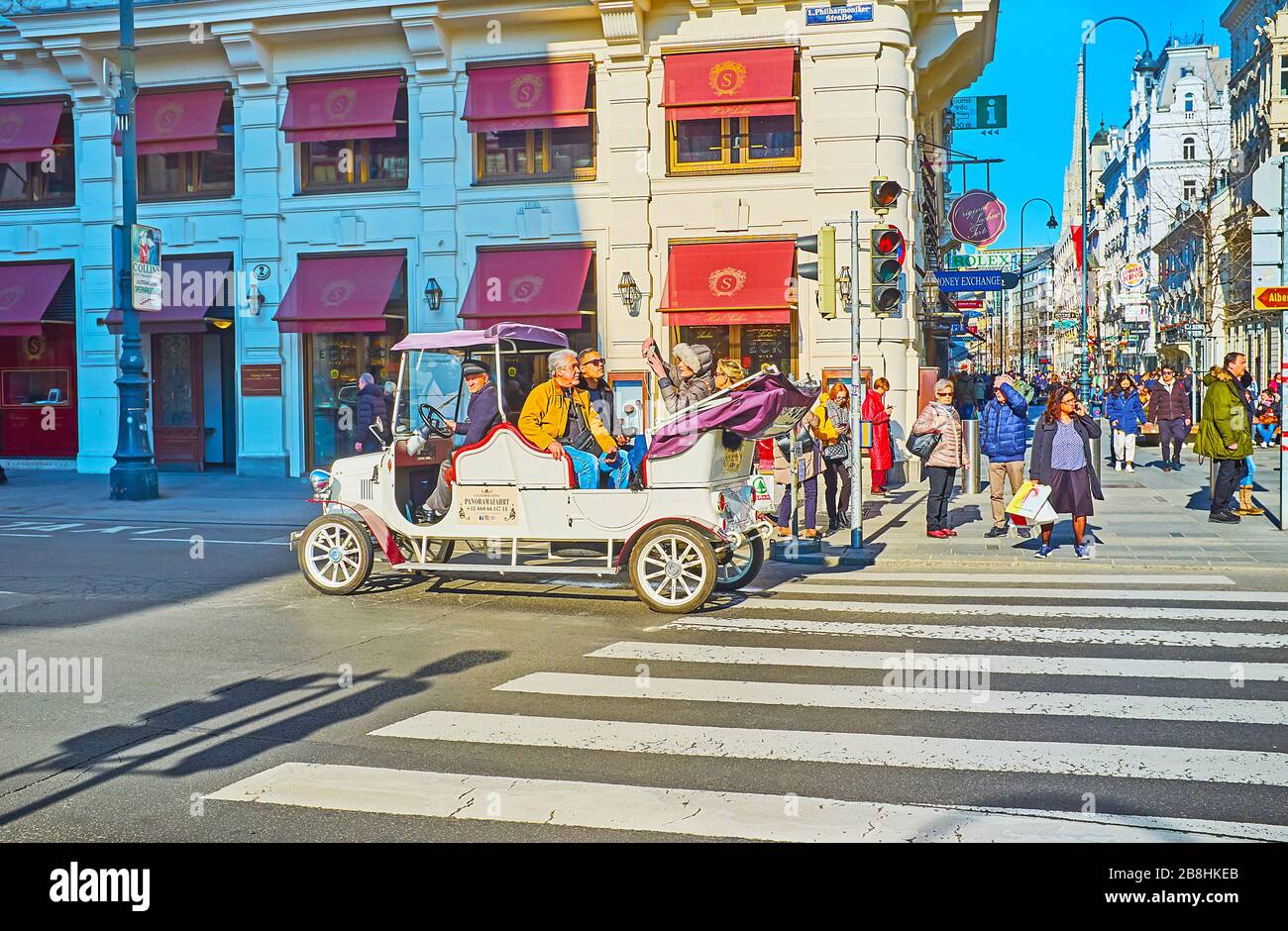 VIENNA, AUSTRIA - FEBRUARY 19, 2019: The tourists enjoy the city tour ...