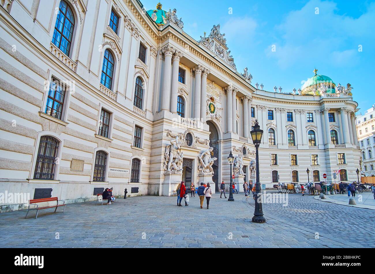 VIENNA, AUSTRIA - FEBRUARY 19, 2019: The crowded Michaelerplatz square ...