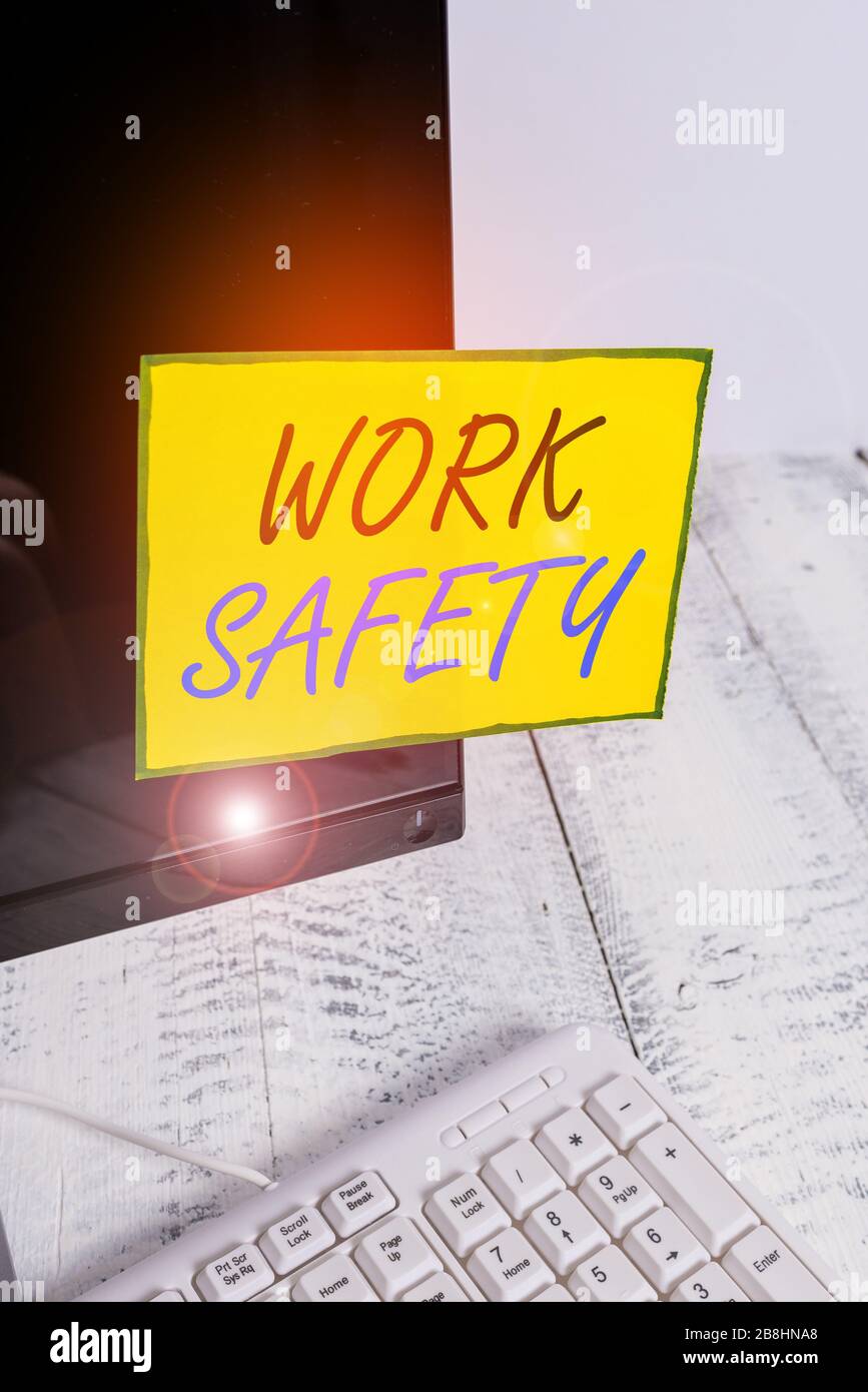 Writing note showing Work Safety. Business concept for policies and ...