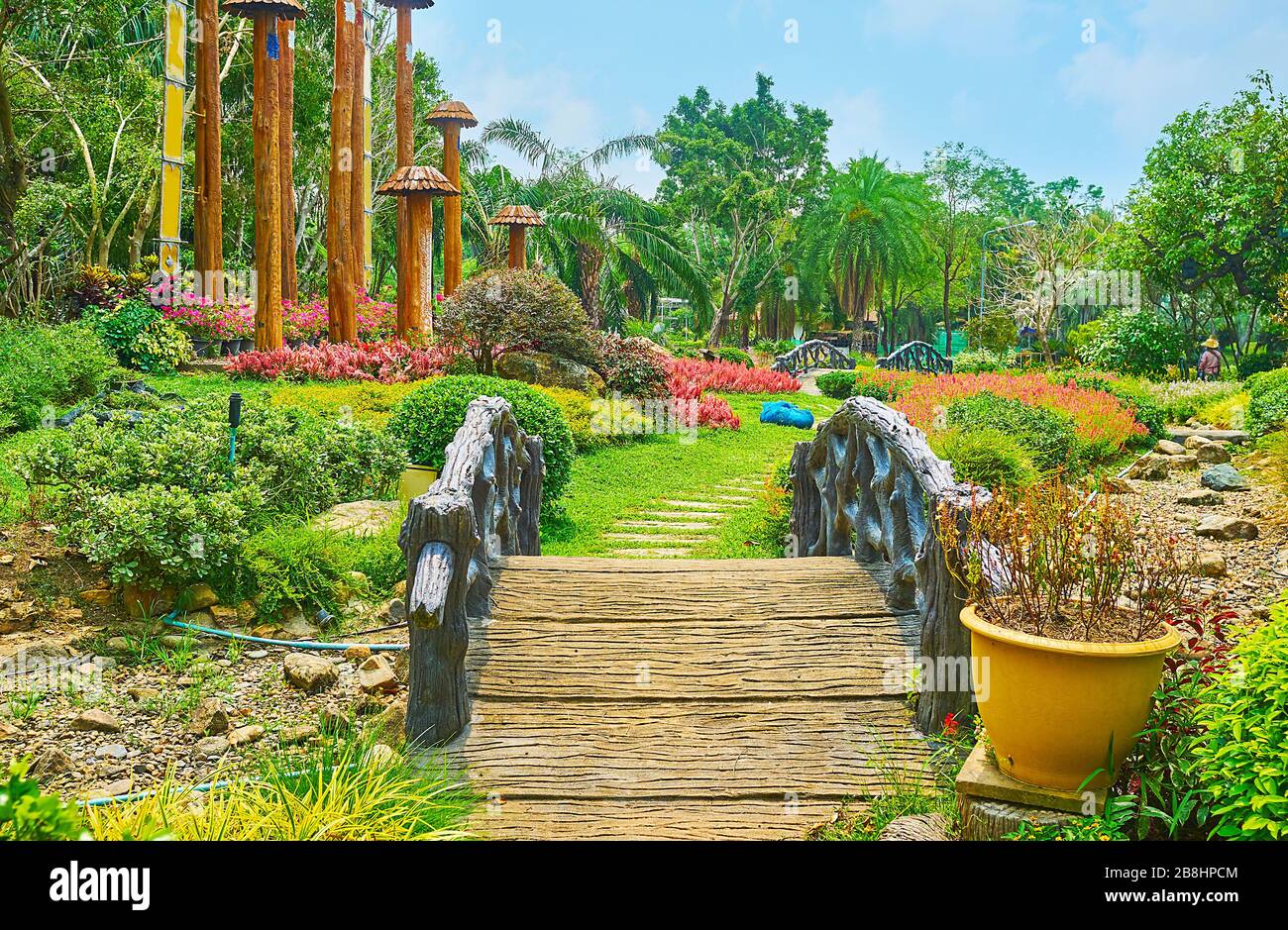 Walk the small bridges and tiny footpathes in beautiful Sawasdee garden ...