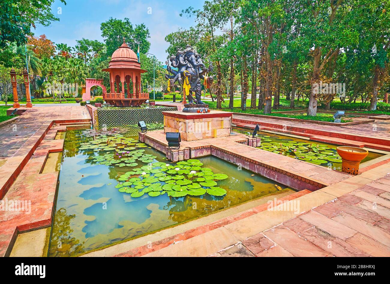 The ochre gamma India garden is decorated with pavilion and Ganesha ...
