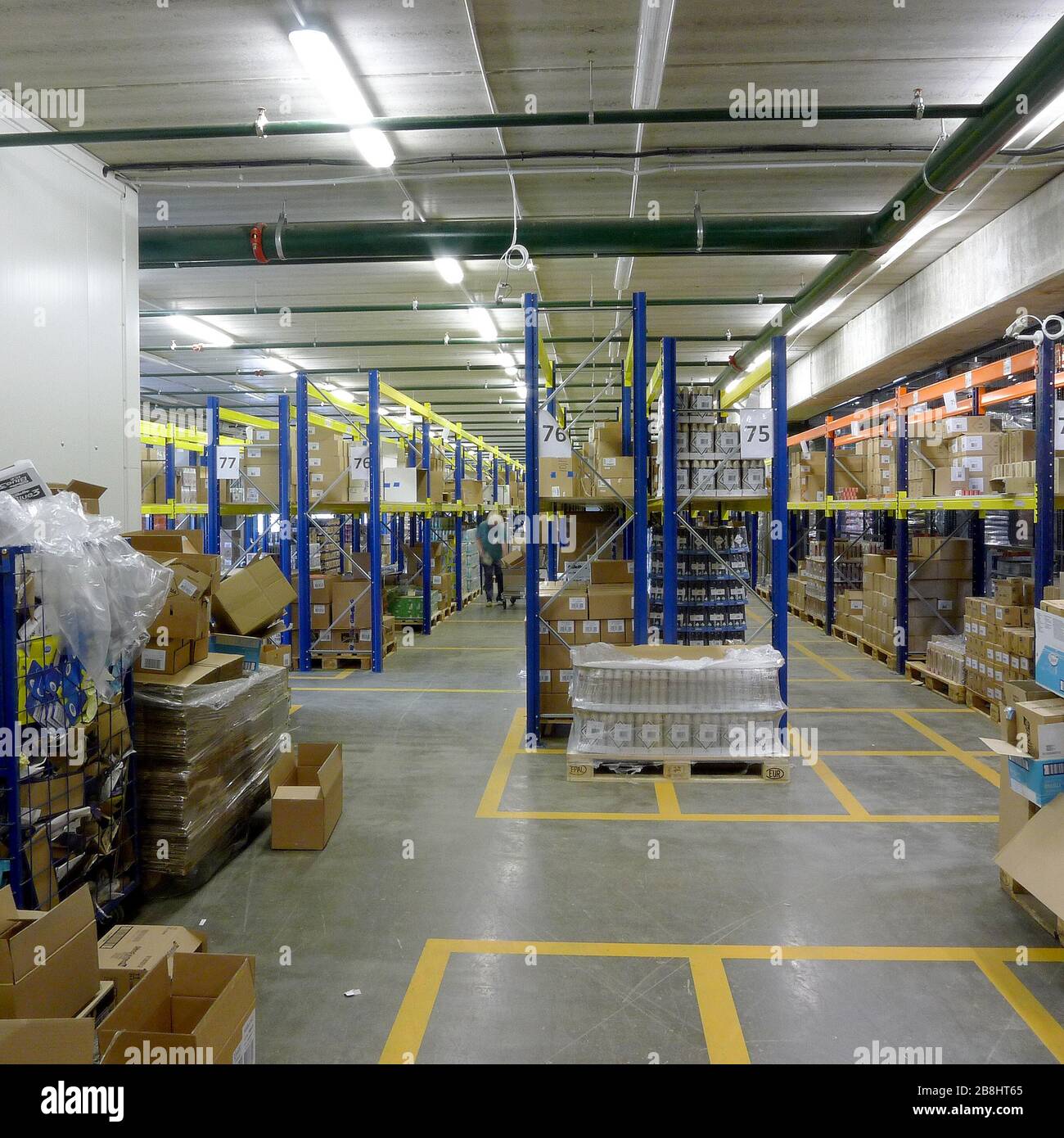 The image of shelves in the warehouse. Logistics, 24-hour work ...