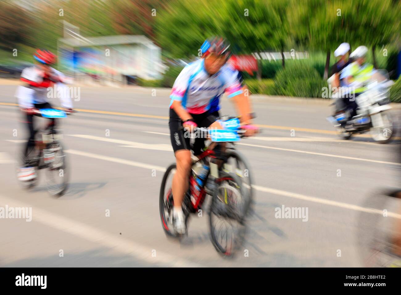 Cycling competition,cyclist athletes riding a race at high speed Stock ...