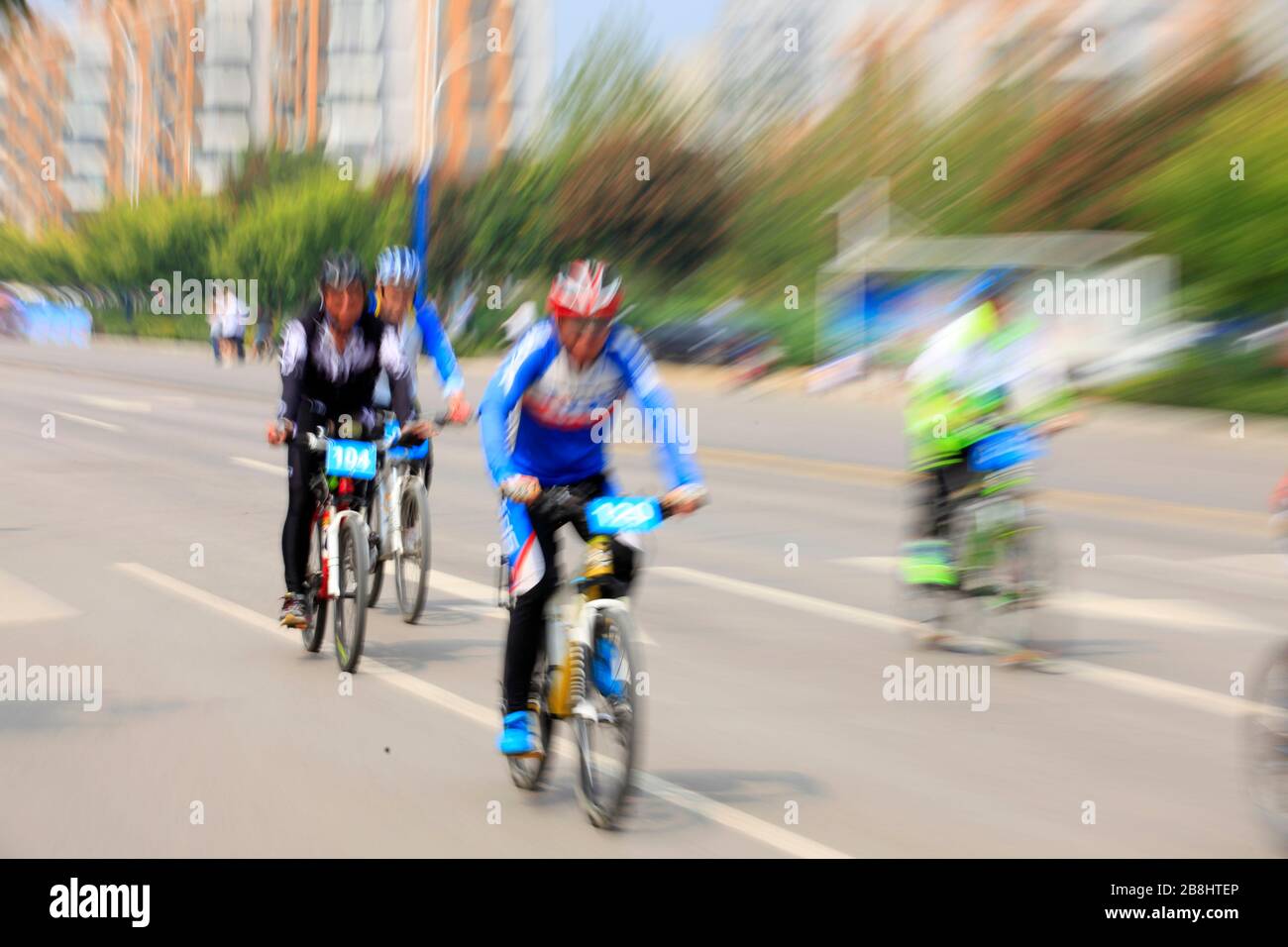 Cycling competition,cyclist athletes riding a race at high speed Stock ...