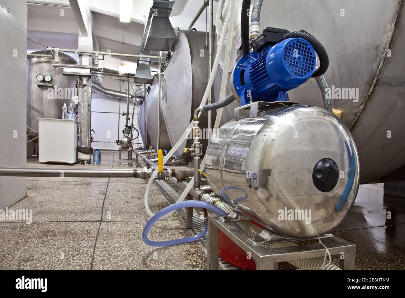Pipes, tubes, engines on factory Stock Photo - Alamy