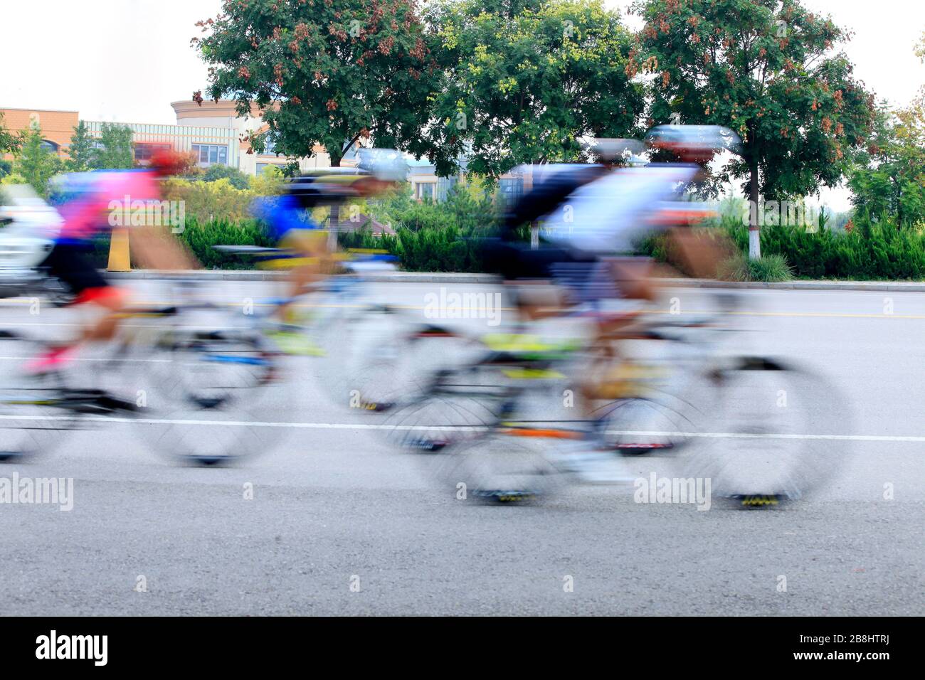 Cycling competition,cyclist athletes riding a race at high speed Stock ...