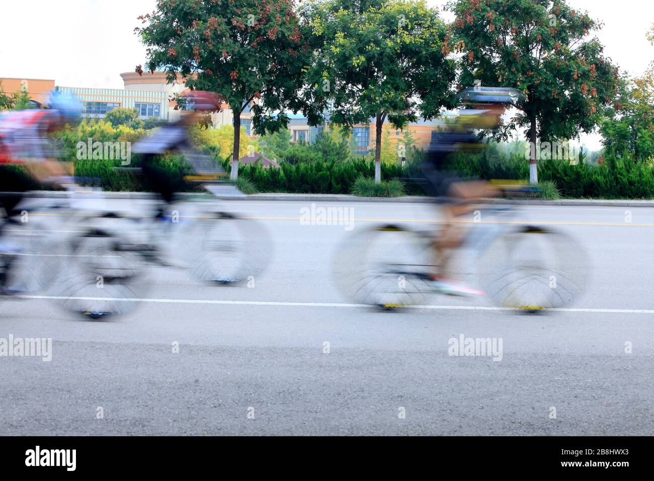 Cycling competition,cyclist athletes riding a race at high speed Stock ...