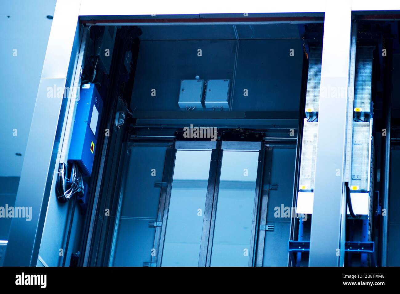lift welding elevator fasteners in lift shaft Stock Photo - Alamy