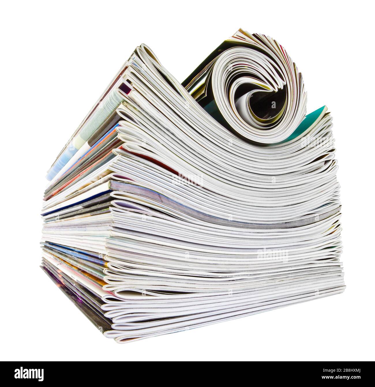 Various stacked and rolled magazines over white Stock Photo - Alamy