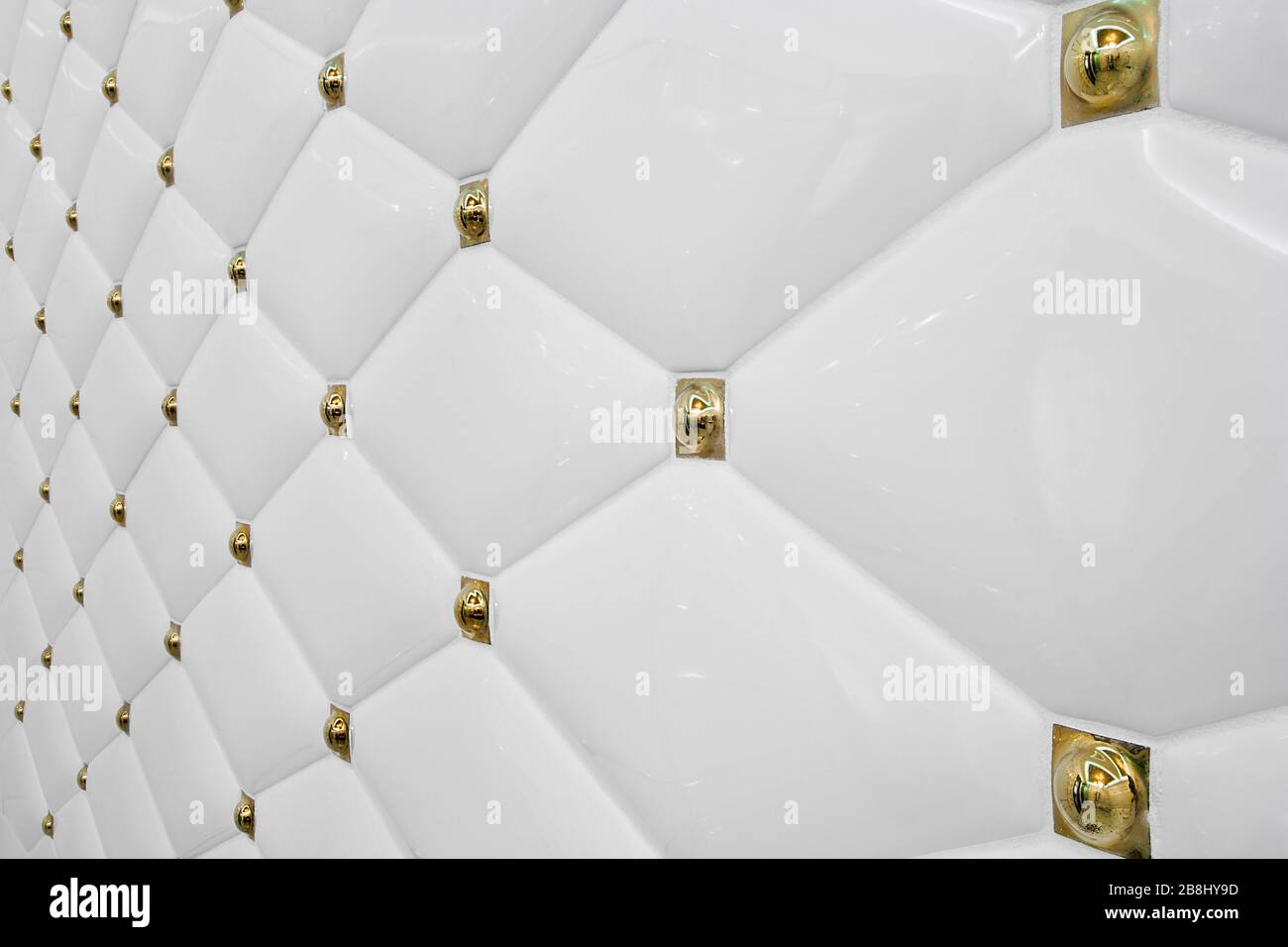 Clean Simple White Tile Wall Background with golden detailing Stock ...
