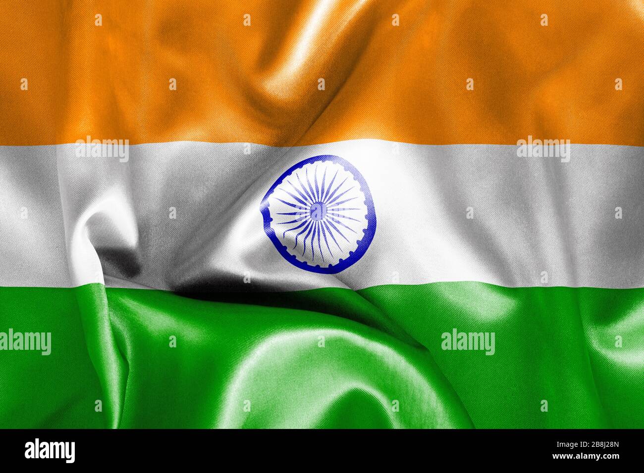 Indian flag texture creased and crumpled up with light and shadows ...