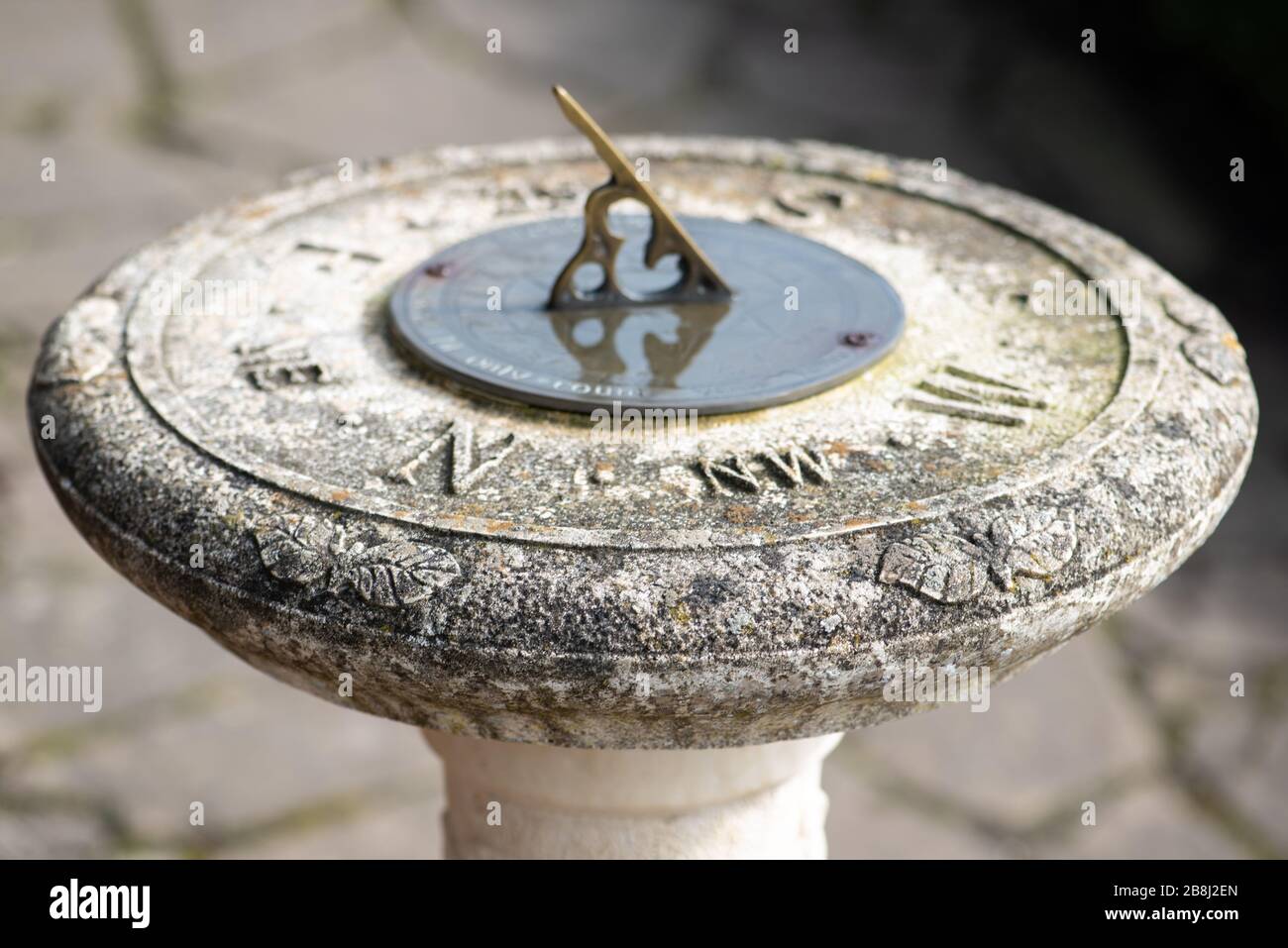 Stone Sundial Garden Ornament UK Stock Photo - Alamy