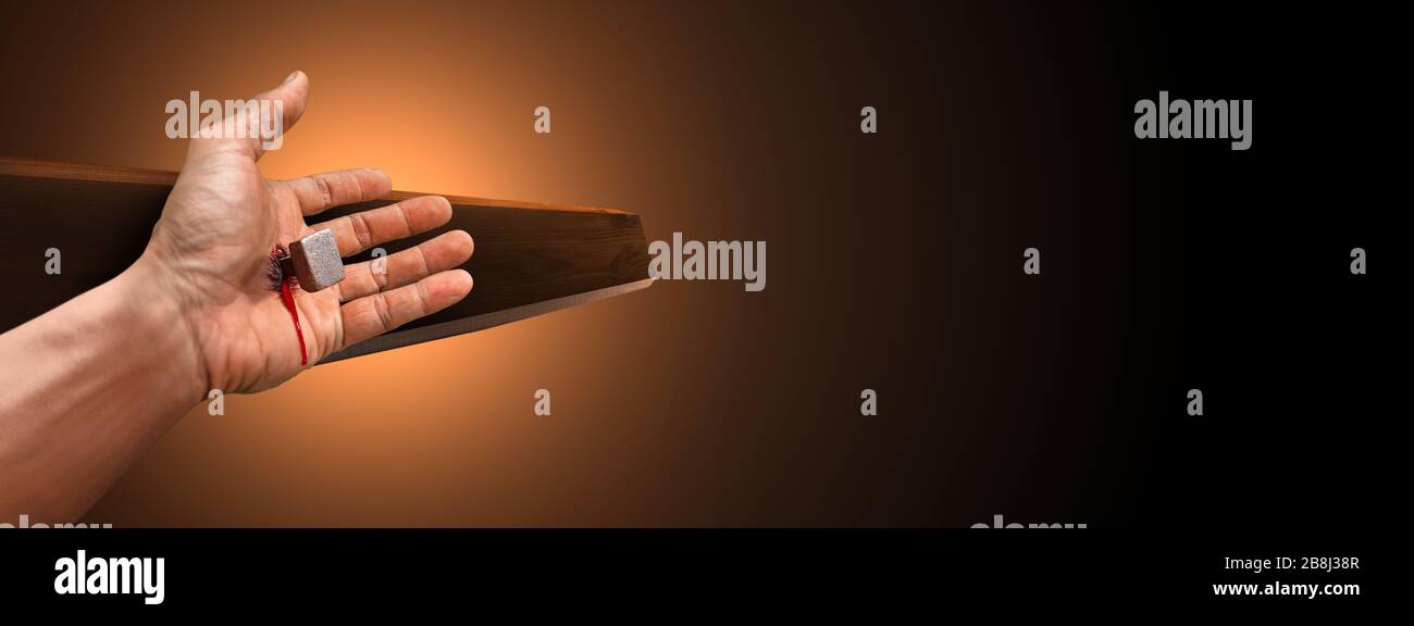 Hand nailed on a cross. Crucifixion of Jesus Christ theme concept Stock Photo - Alamy
