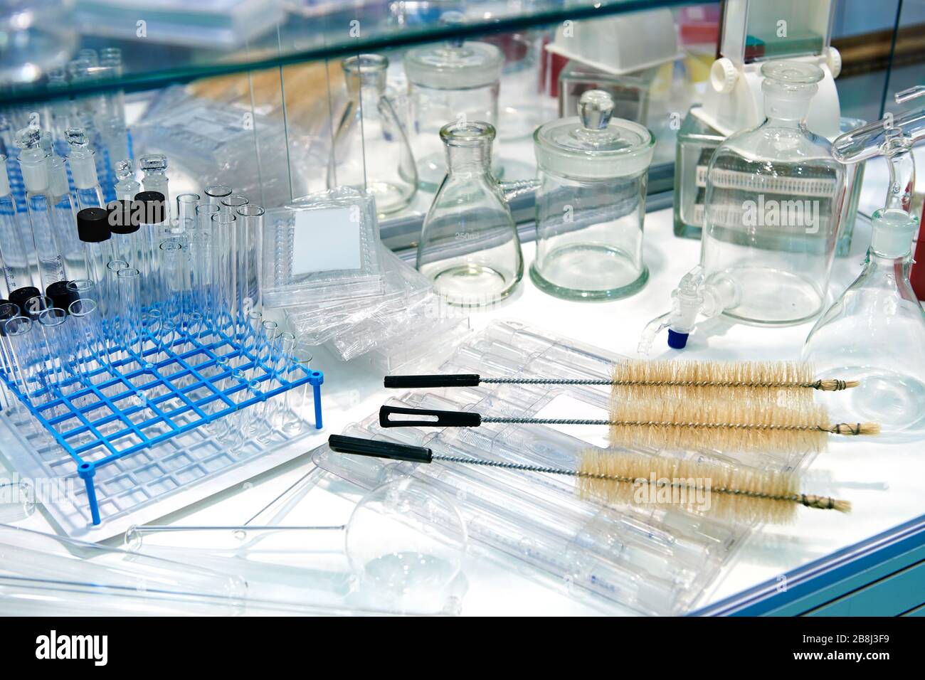 Chemical and medical glassware in showcase store Stock Photo - Alamy