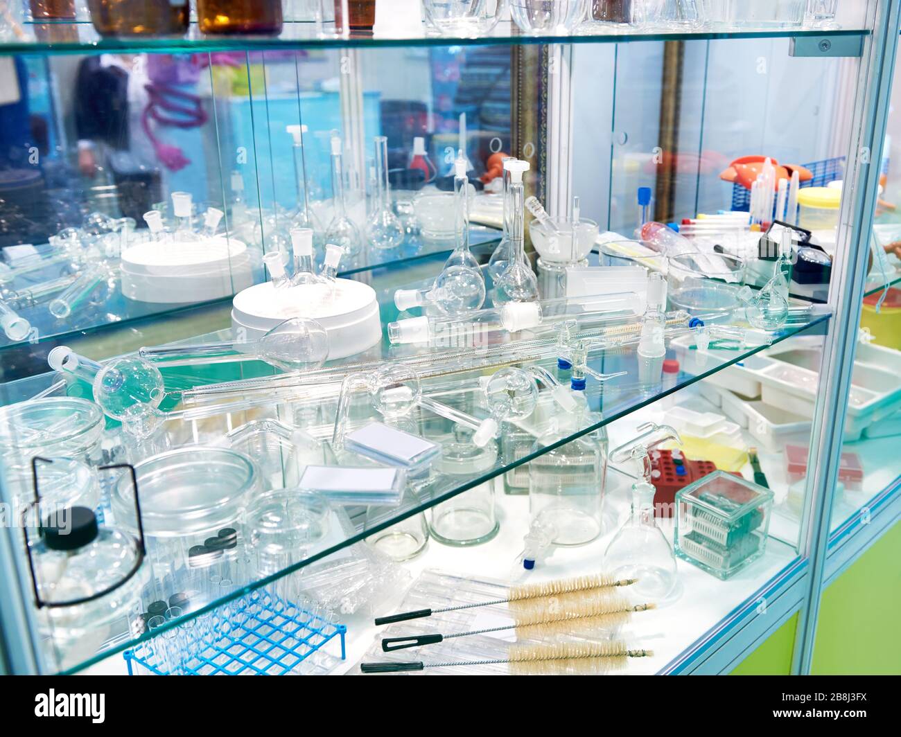 Chemical and medical glassware in showcase store Stock Photo - Alamy