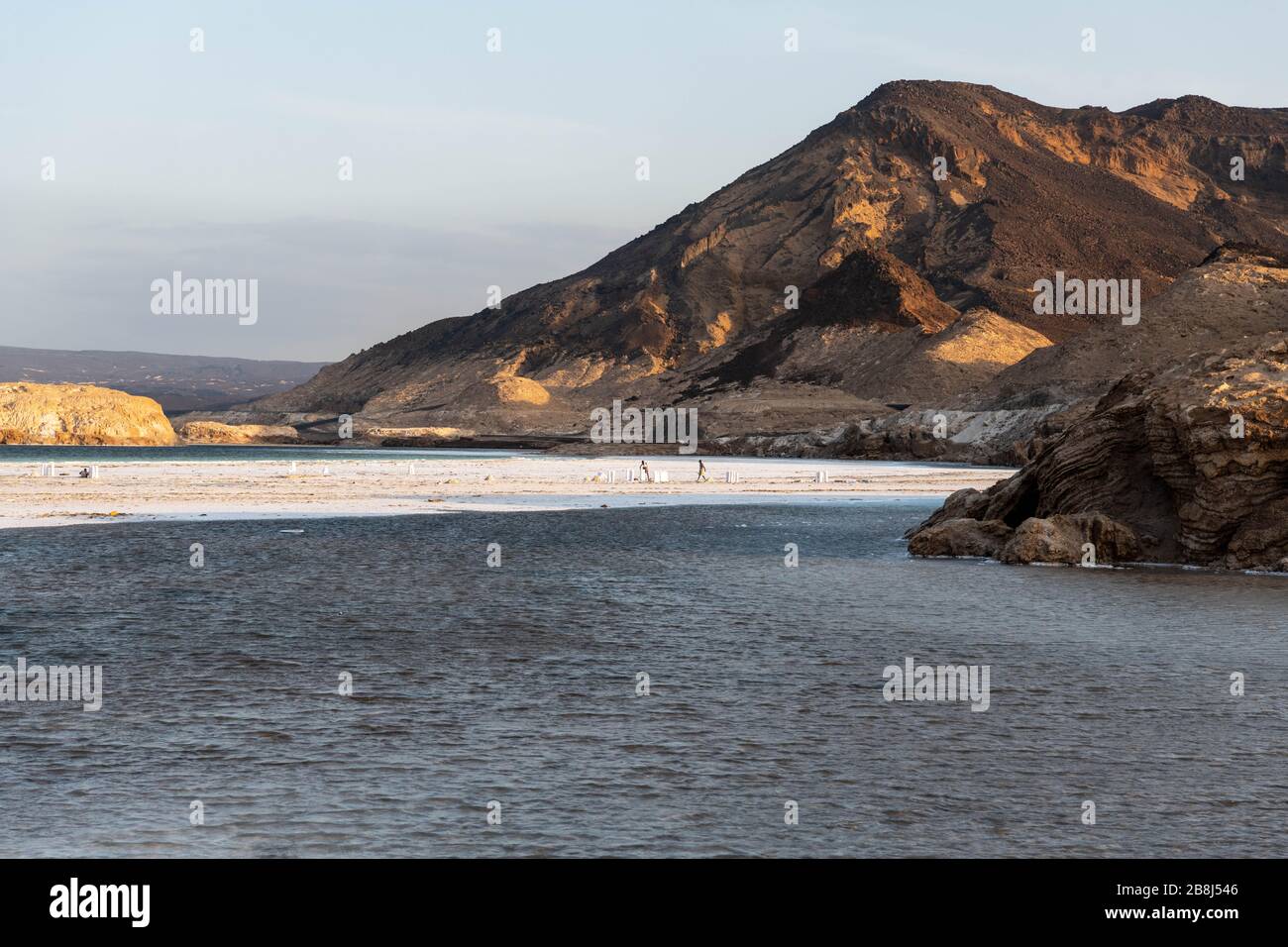 Africa, Djibouti, Lake Assal. Landscape view of lake Assal with people ...