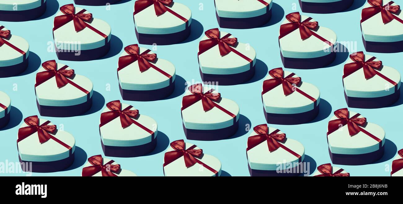 Gift boxes background with repetition of identical presents Stock Photo ...