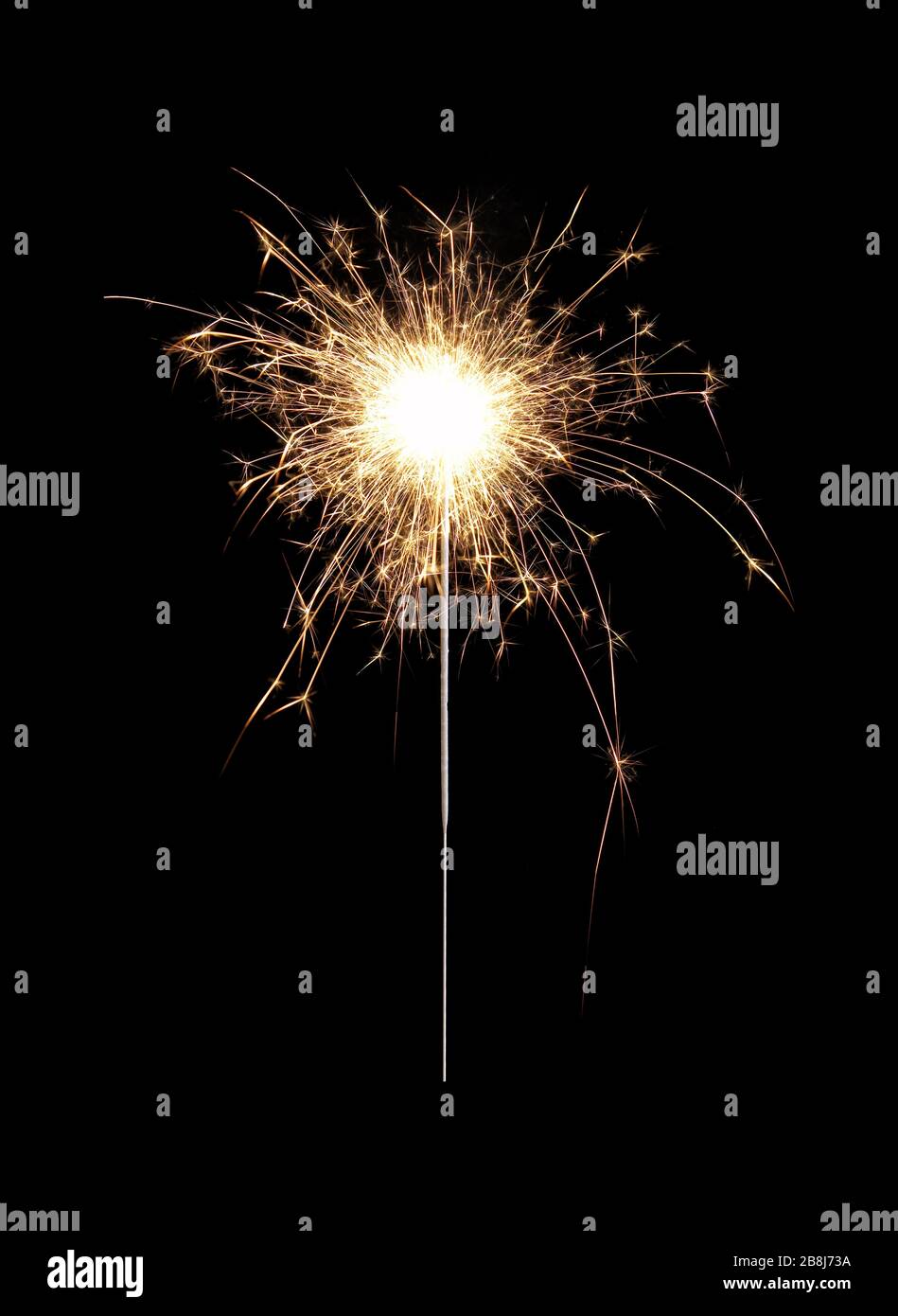 Burning christmas sparkler isolated on black background. Bengal fire ...