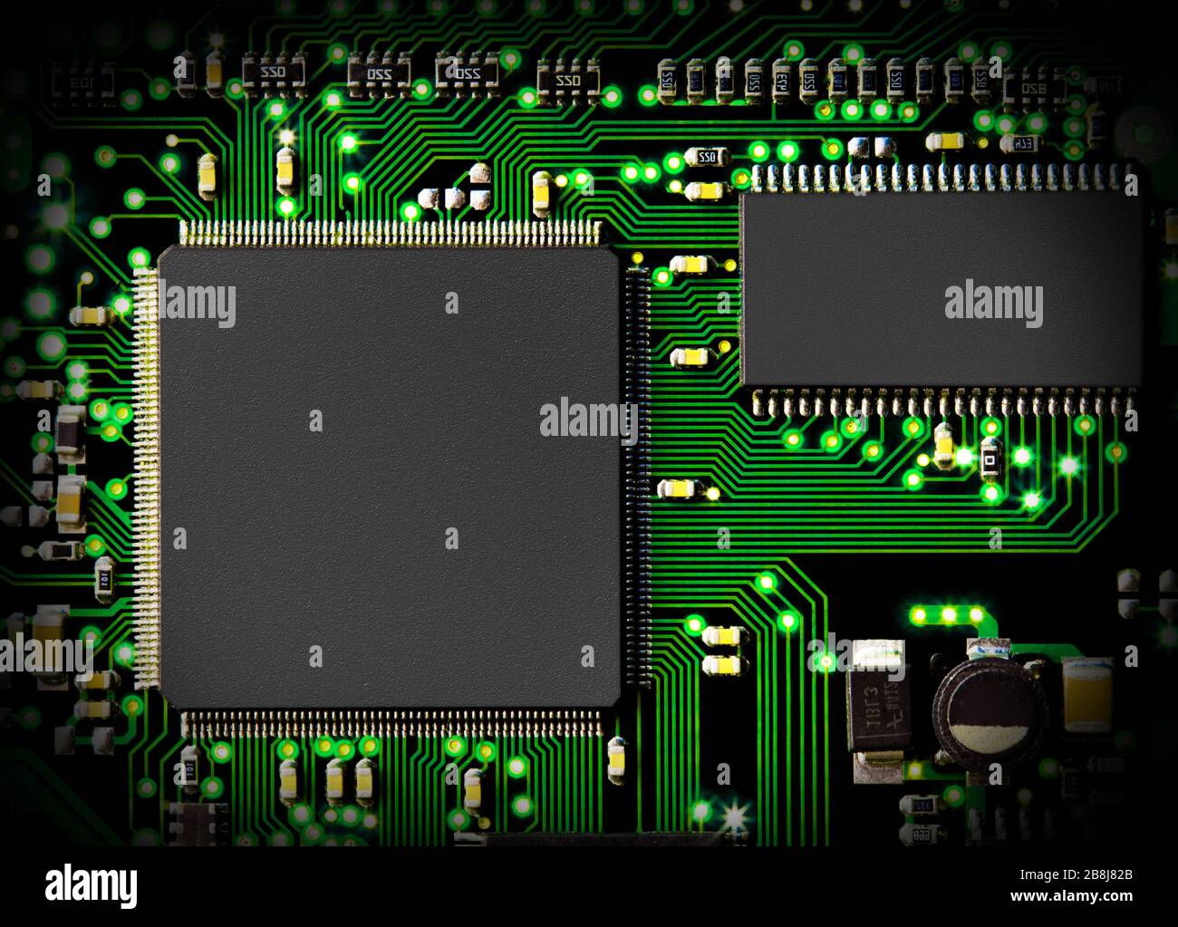 circuit board in green with transistors and chip Stock Photo - Alamy