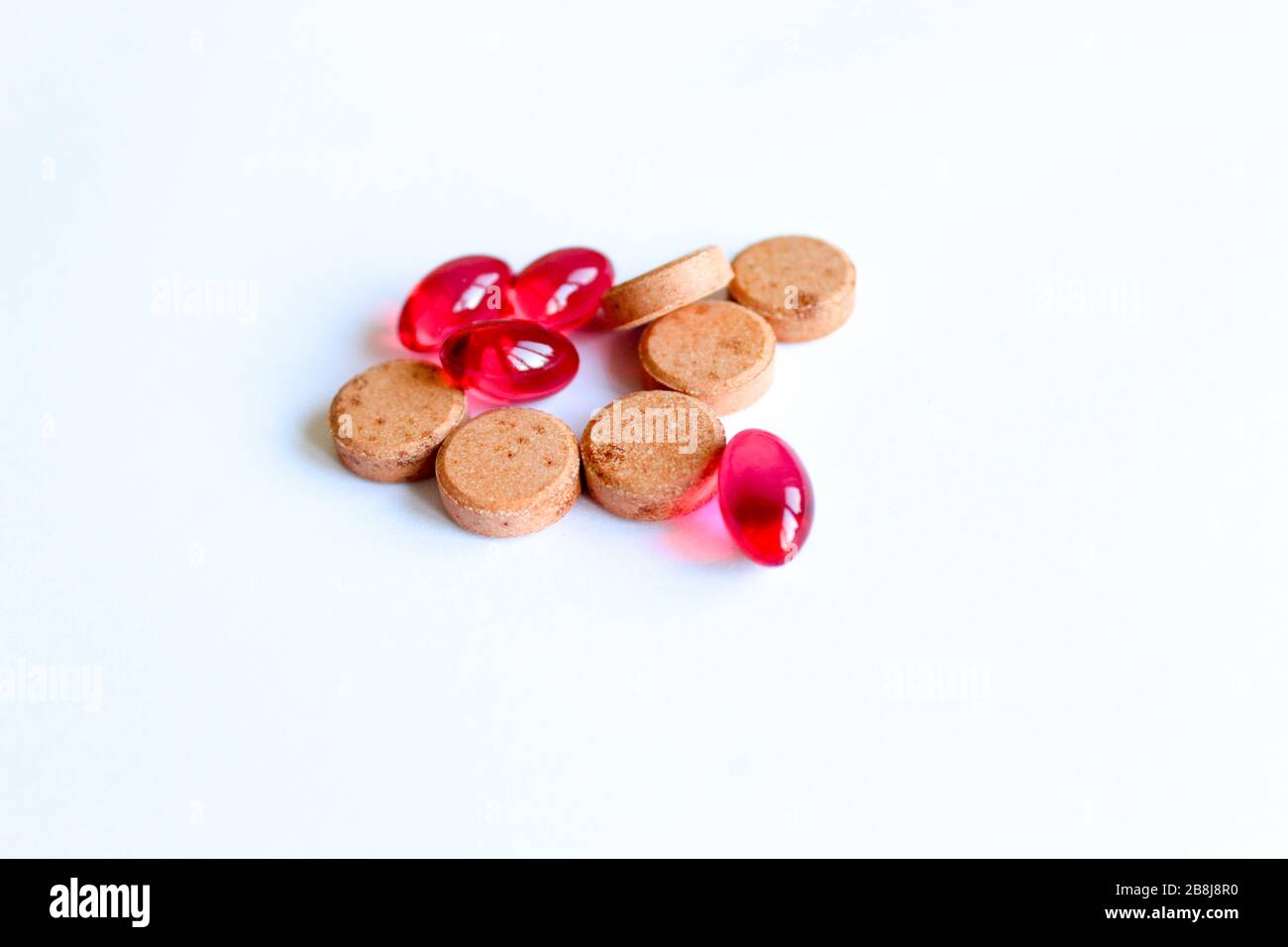 Vitamin tablets color red hi-res stock photography and images - Alamy