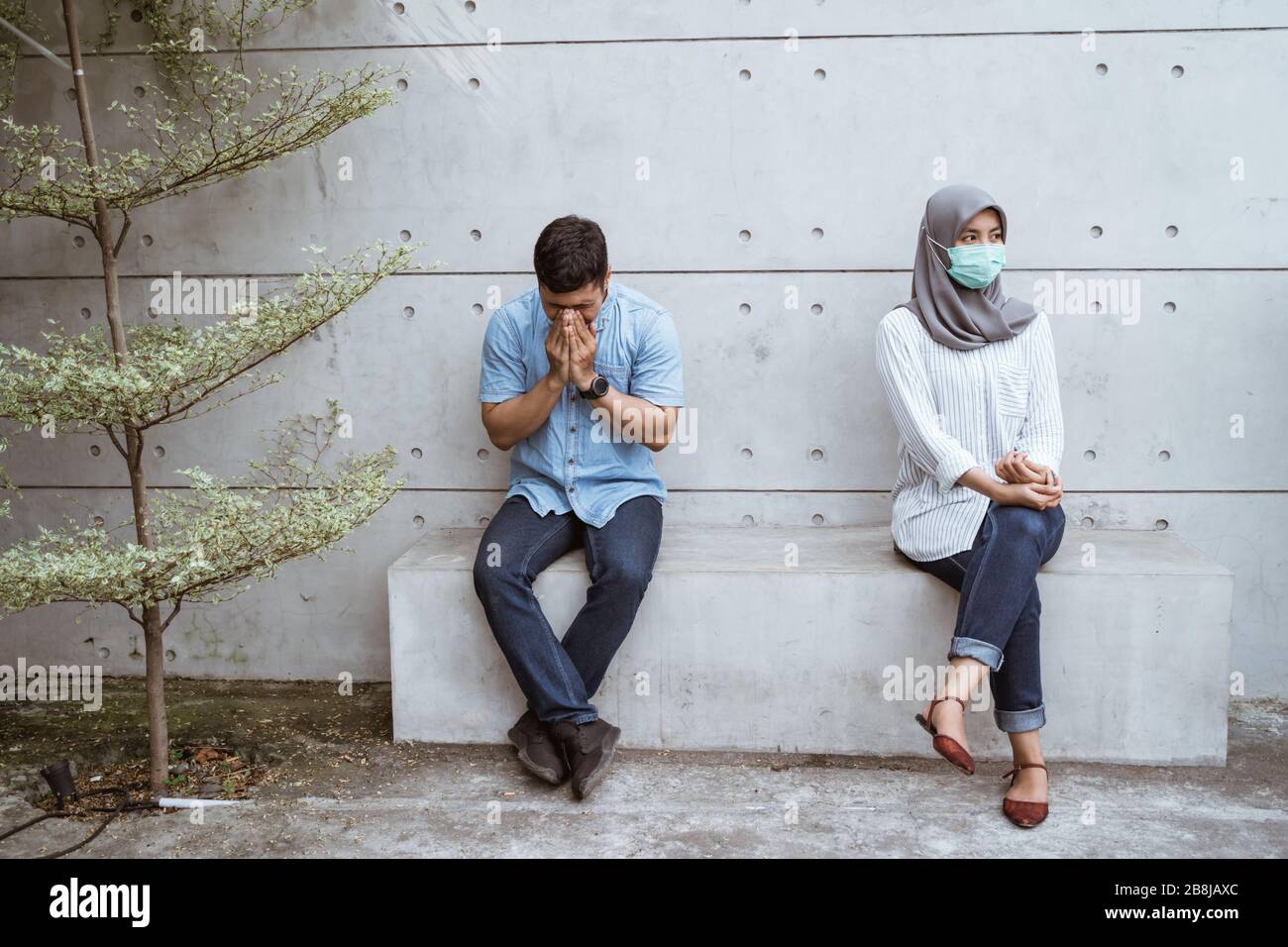 social distancing. friend keep the distance while sick Stock Photo - Alamy