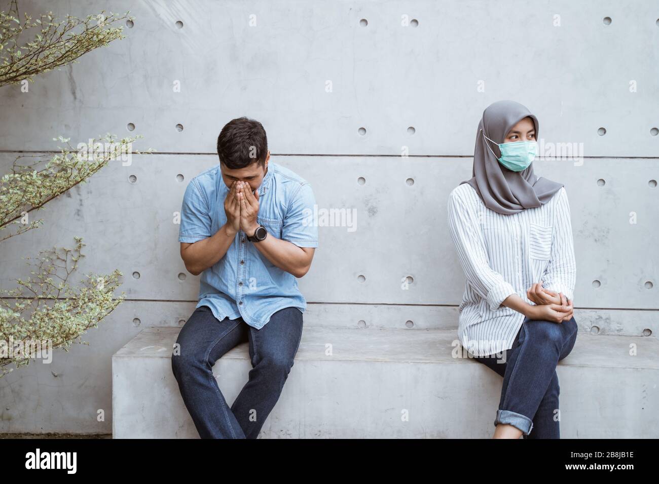 social distancing. friend keep the distance while sick Stock Photo - Alamy