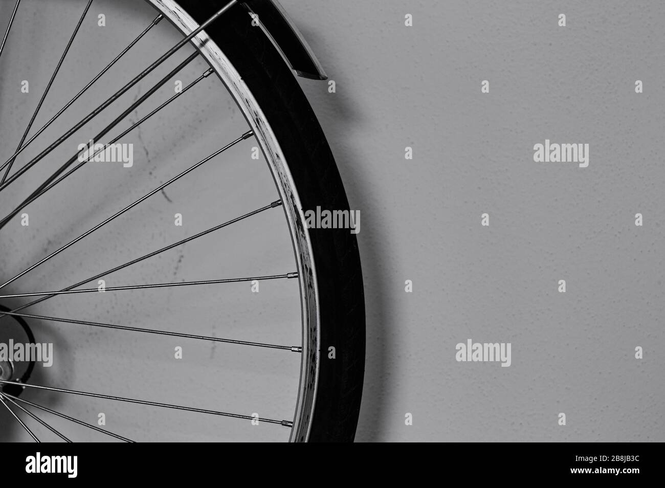 Vintage bicycle wheel shadow in black and white hi-res stock ...
