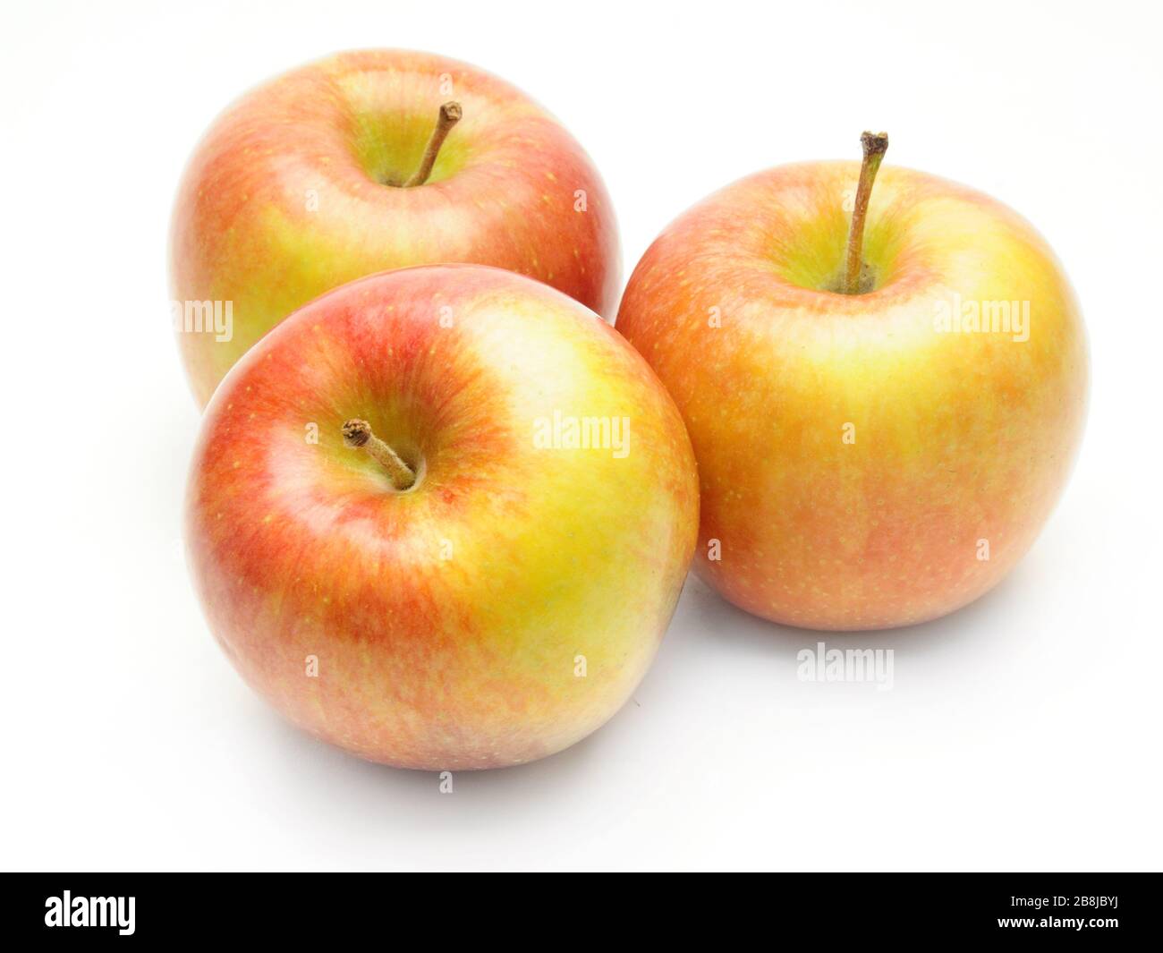 Ripe apples on an isolated white background Stock Photo - Alamy