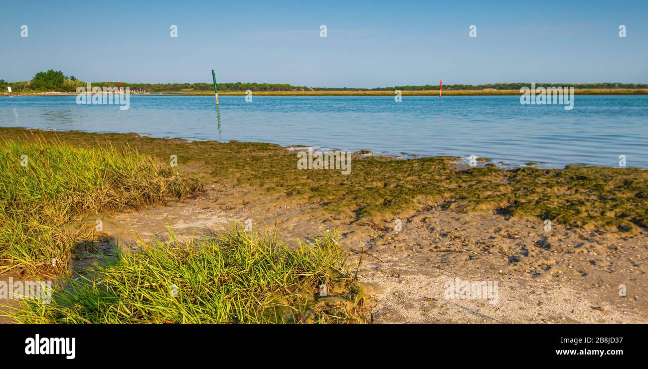 beach scenery inside Bibione Pineda lagoon during an early september ...