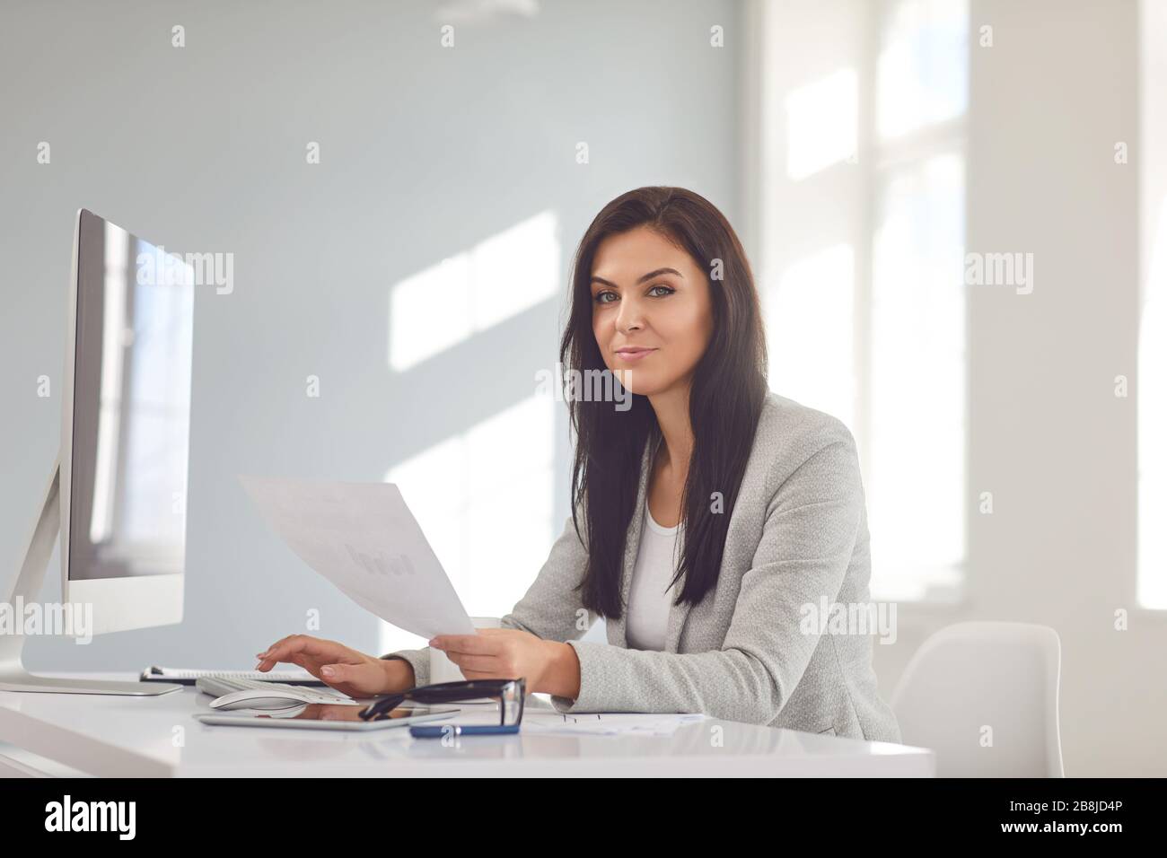 Woman freelancer designer programmer agent secretary sitting at the ...