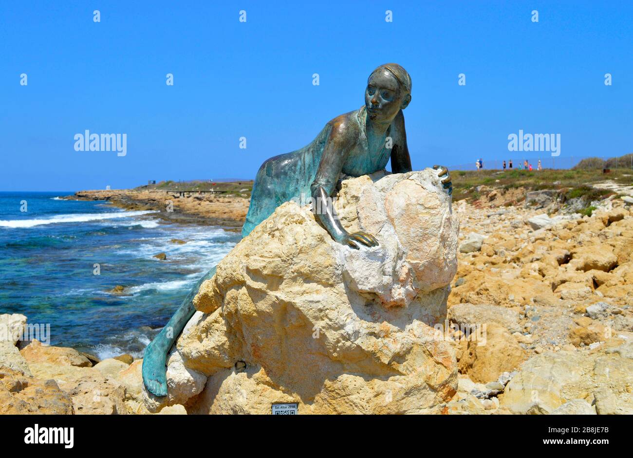 A bronze statue of woman called Sol Alte by Yiota Ioannidou on a stone ...