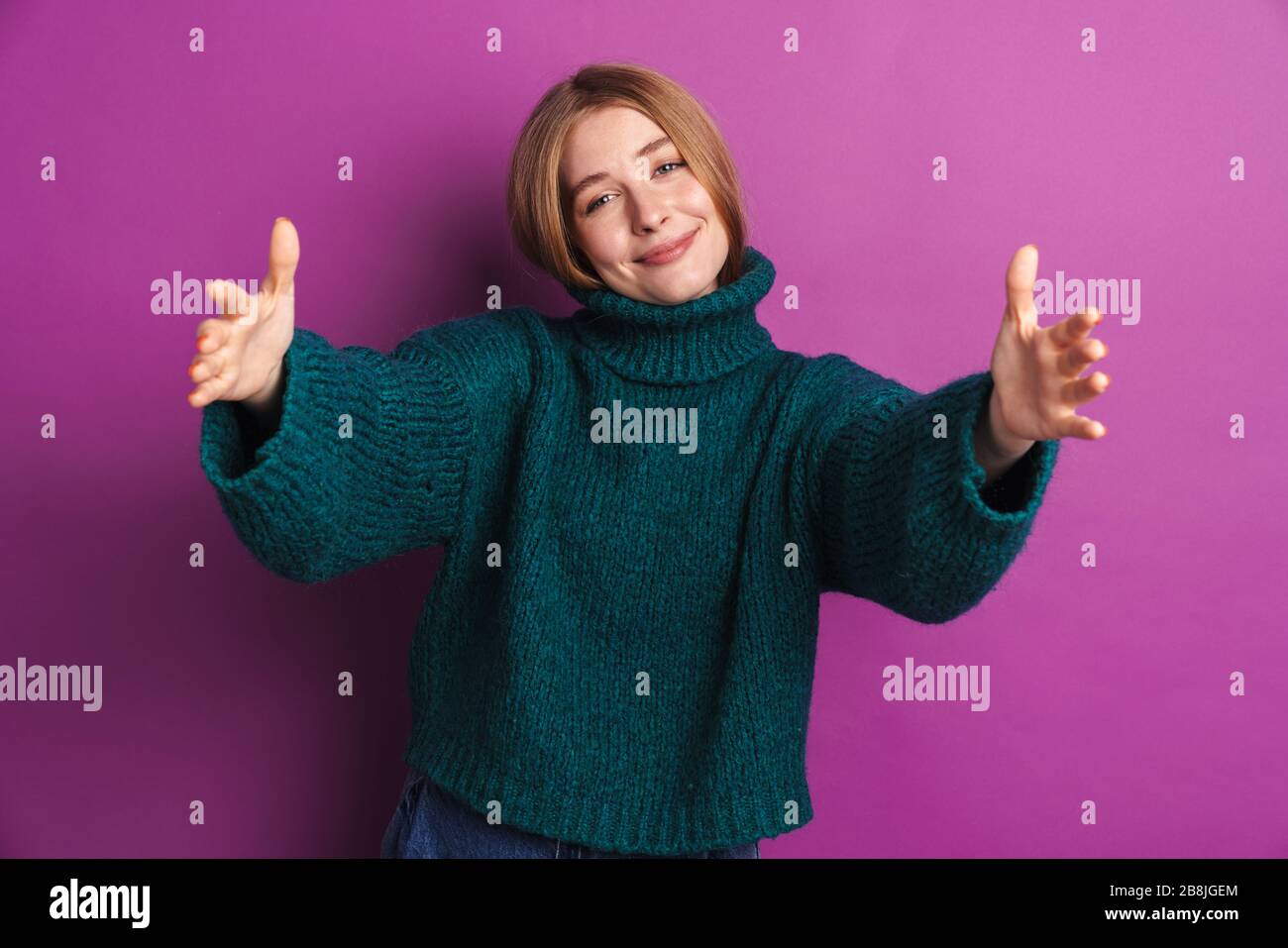 Image of cheery cute young woman posing isolated over purple wall ...