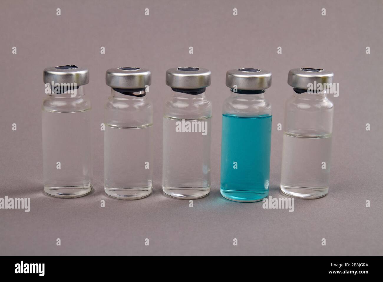 Five medical vial ampoules with various medicine Stock Photo - Alamy