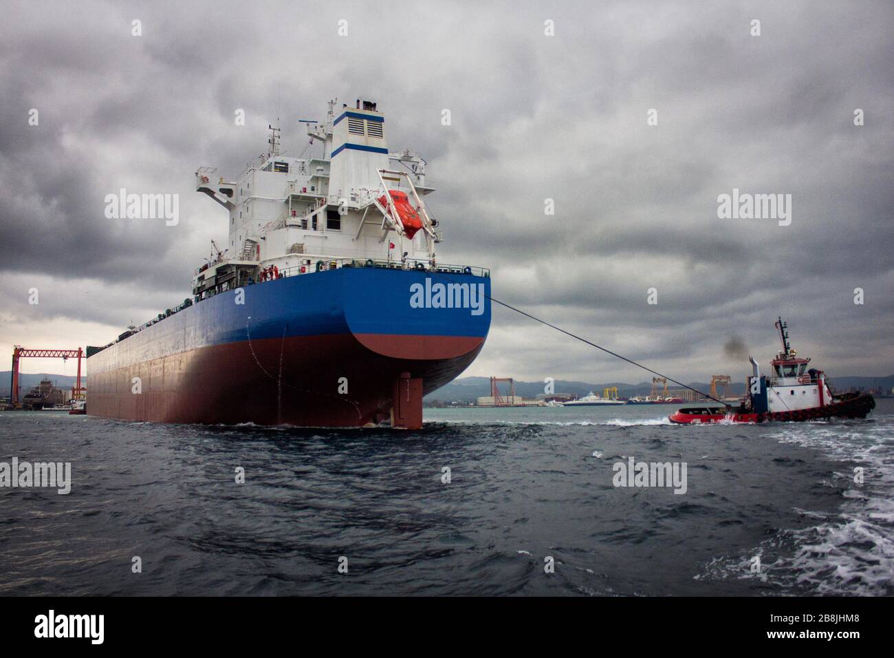 launching of renovated tanker cargo ship from dock to water Stock Photo ...