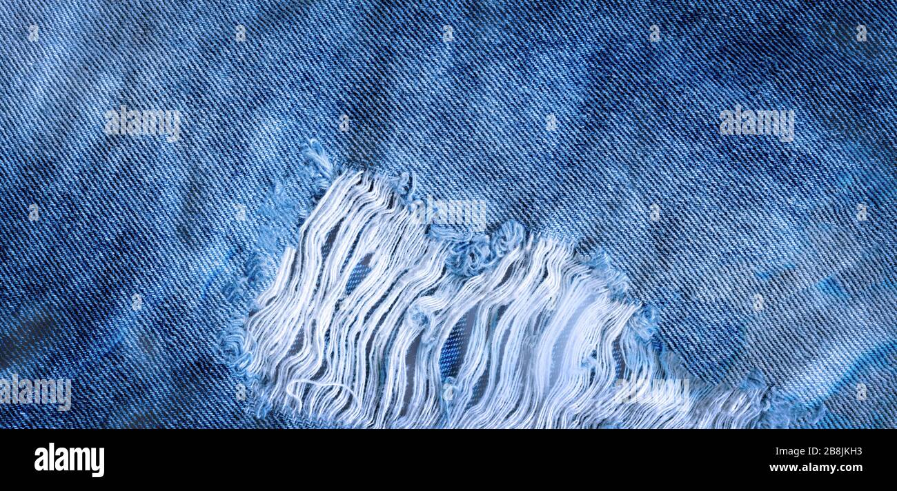Denim jeans with old torn. Jeans torn denim texture. Denim jeans ripped ...