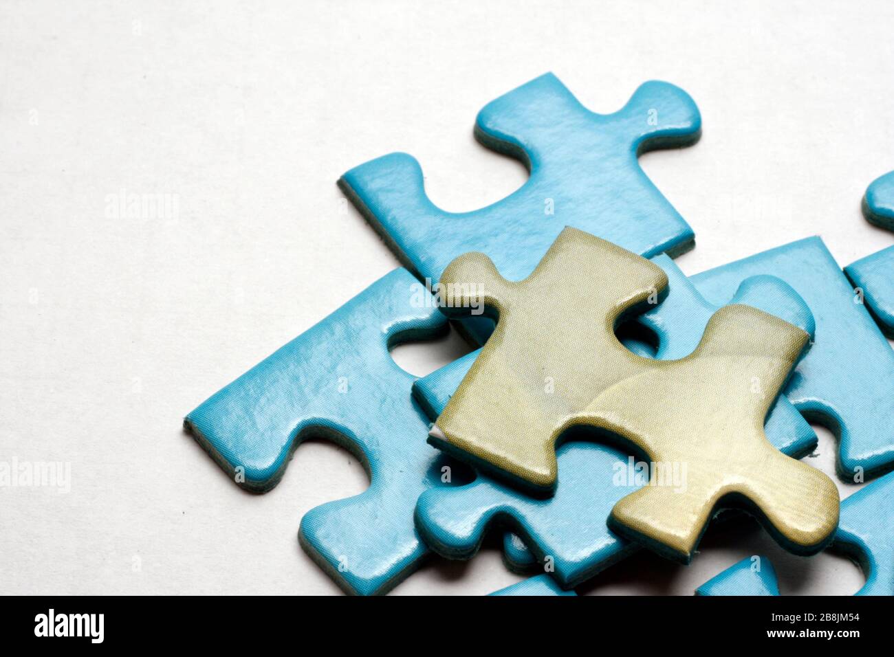 Blue puzzle pieces on white background Stock Photo - Alamy