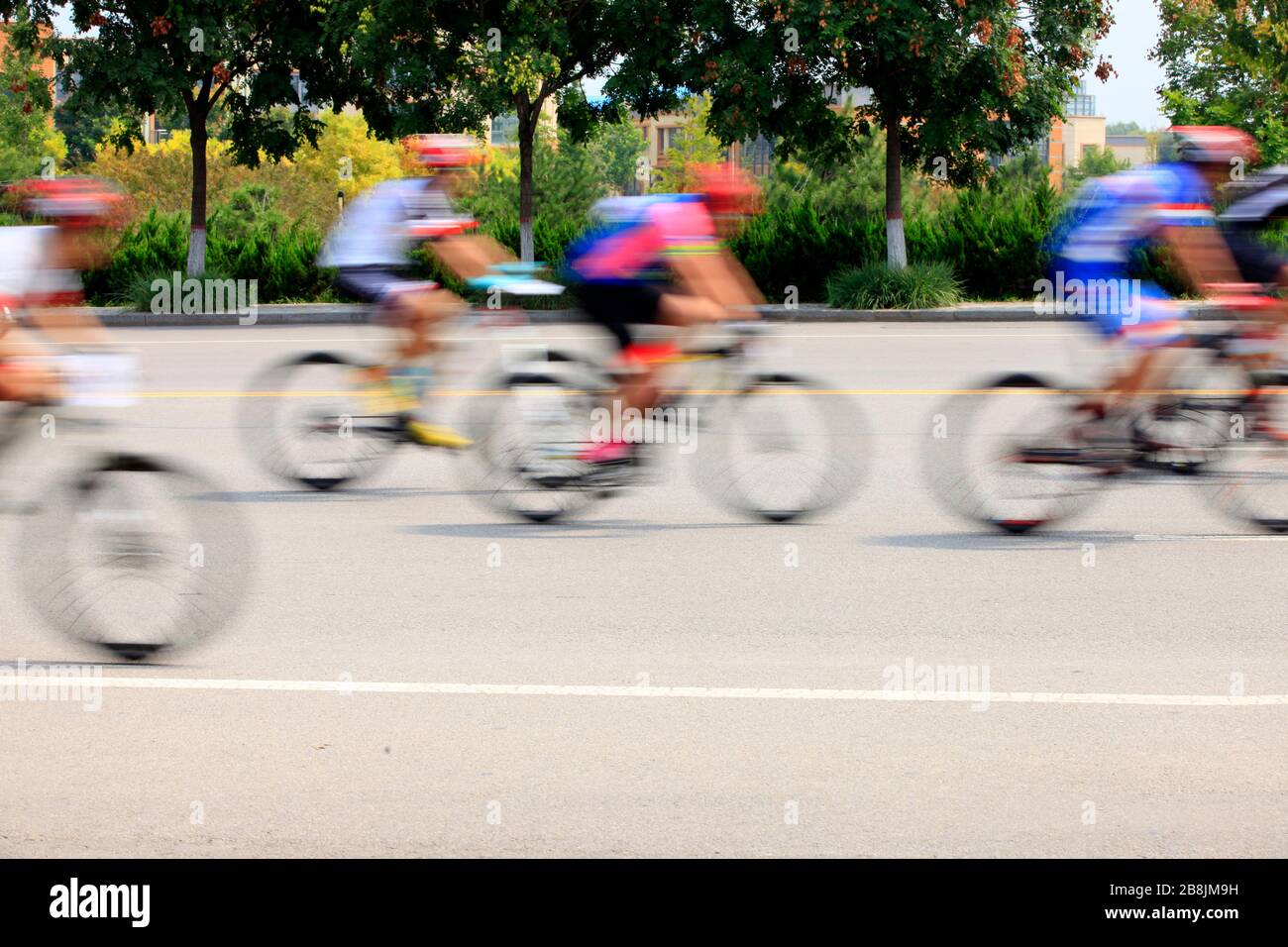 Cycling competition,cyclist athletes riding a race at high speed Stock ...