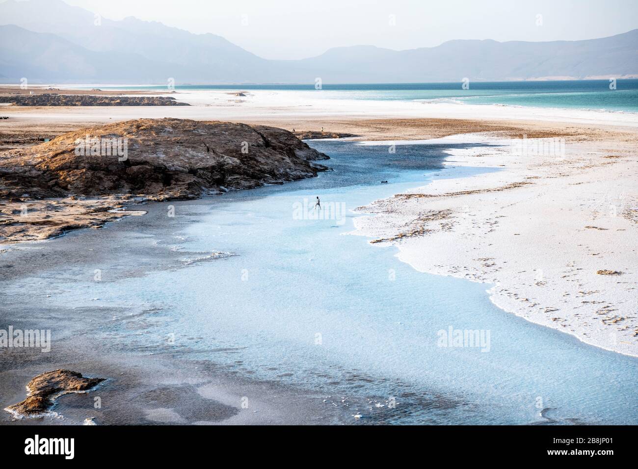 Africa, Djibouti, Lake Assal. Landscape view of lake Assal with people ...