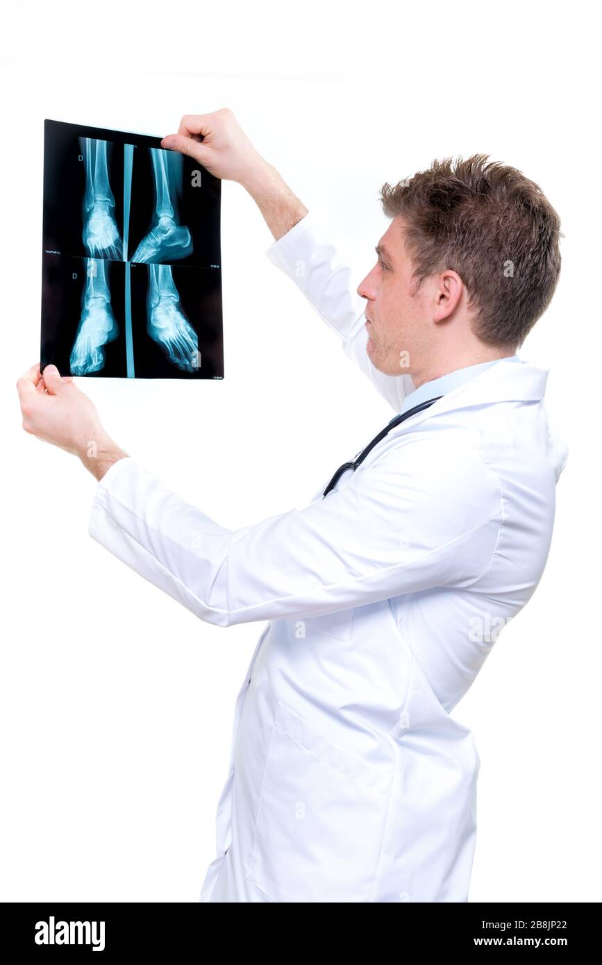 attractive and expressive doctor holding an foot x-ray Stock Photo - Alamy