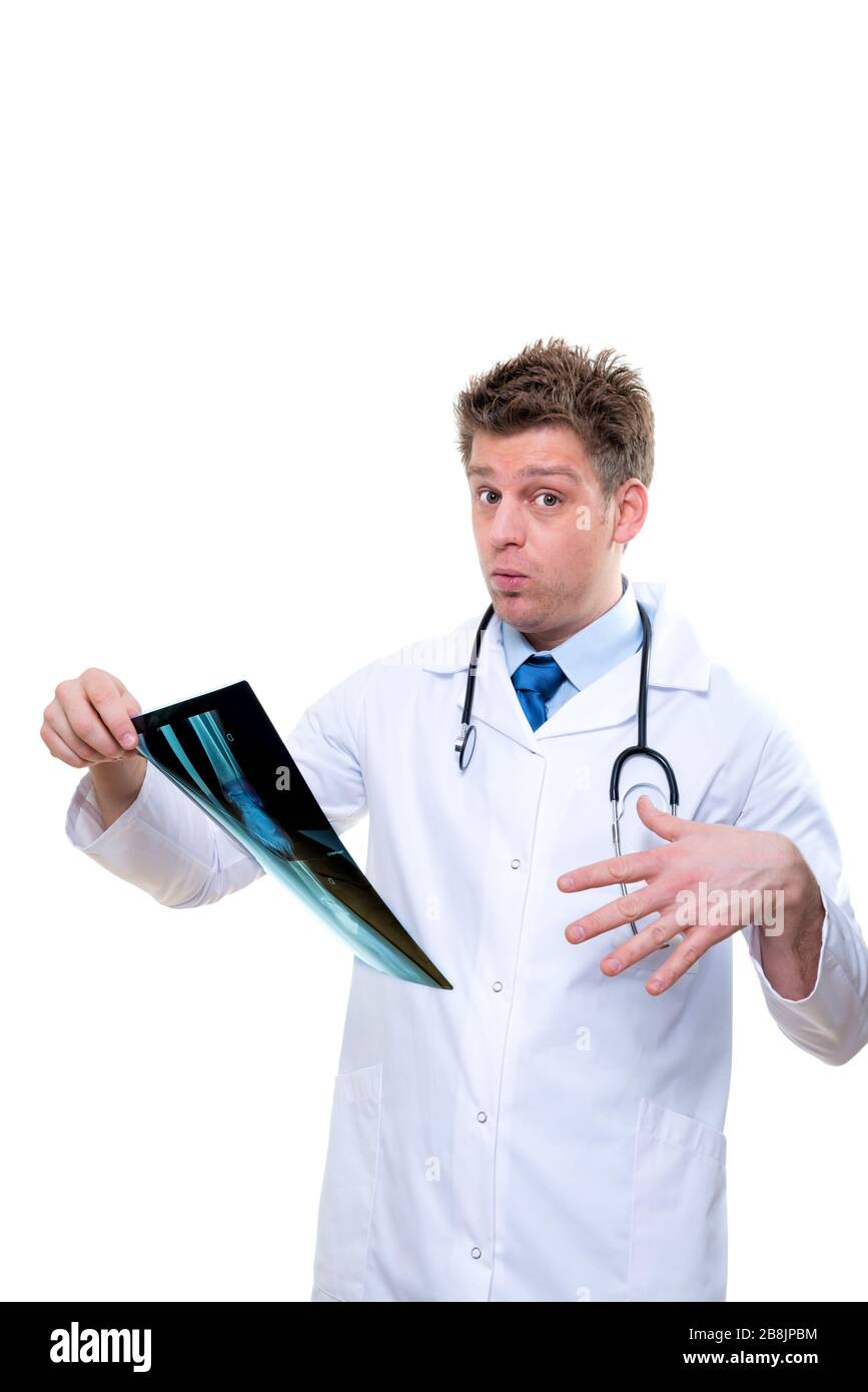 expressive doctor examining broken foot xray Stock Photo - Alamy