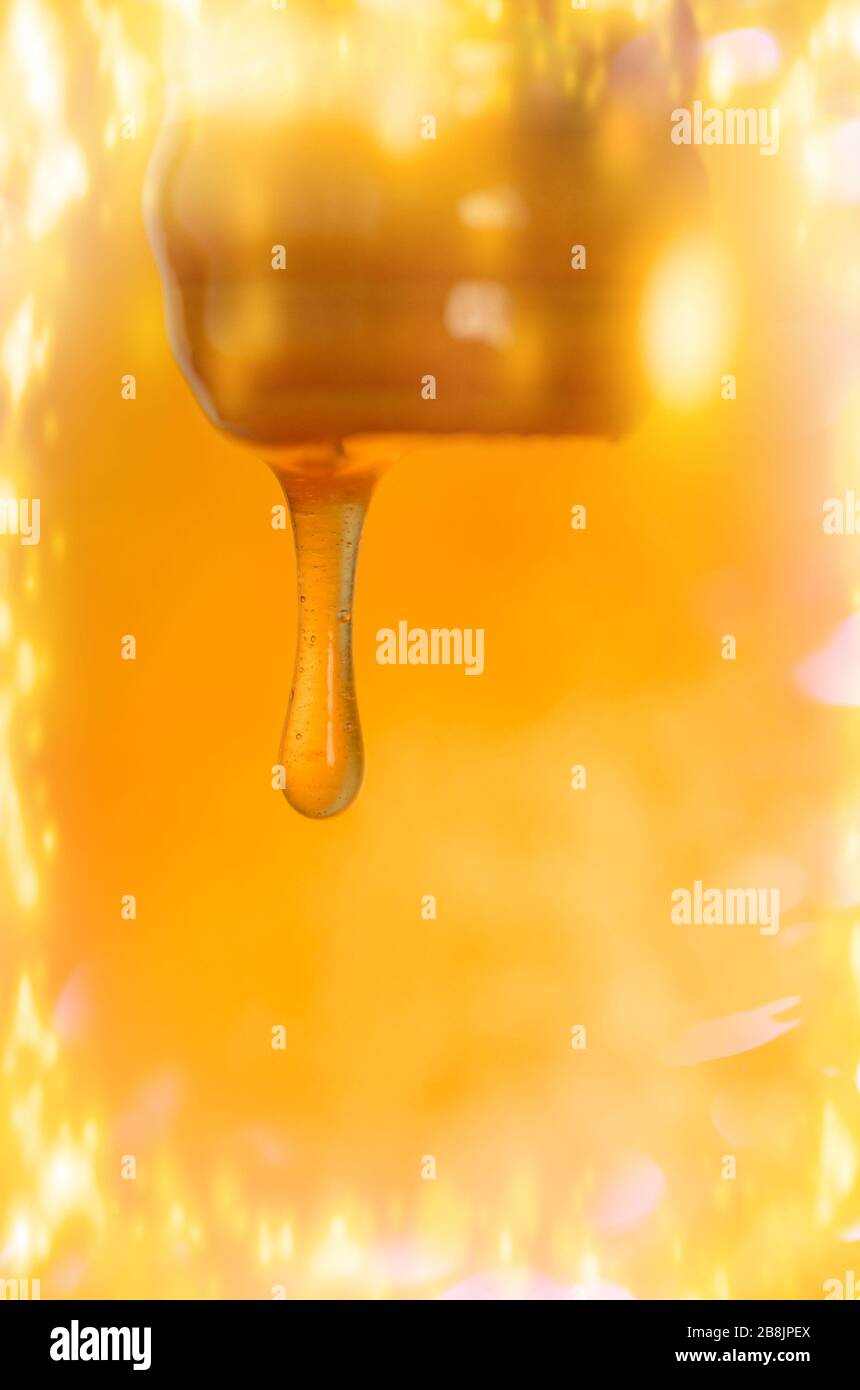 Melted caramel dripping. Pouring stream of caramel sauce. Hot sweet ...