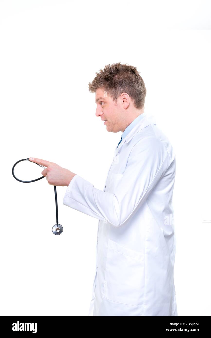 Side view of doctor speaking somebody with stethoscope Stock Photo - Alamy